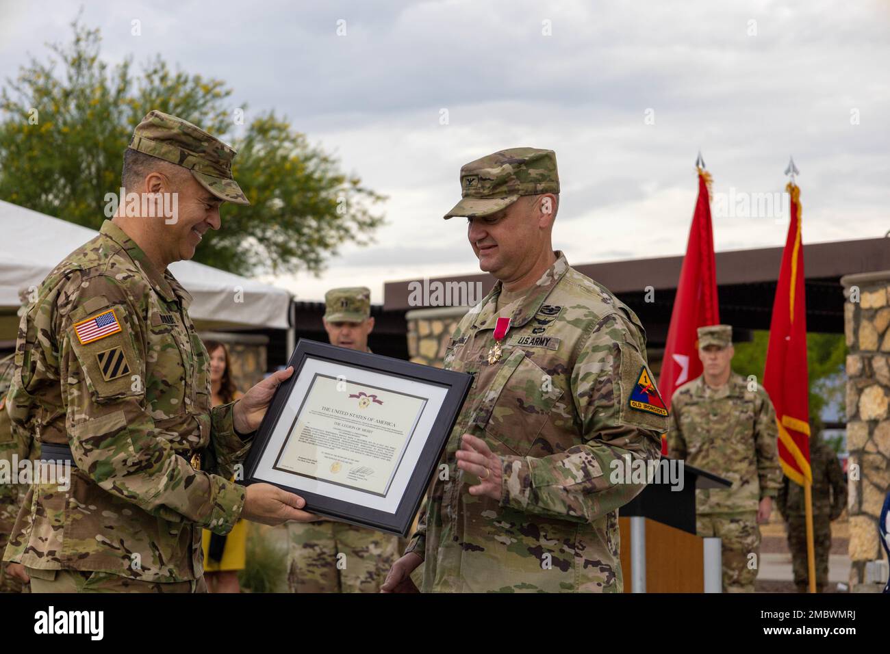 Col. Geoffrey Whittenberg, the outgoing commander, is presented with ...