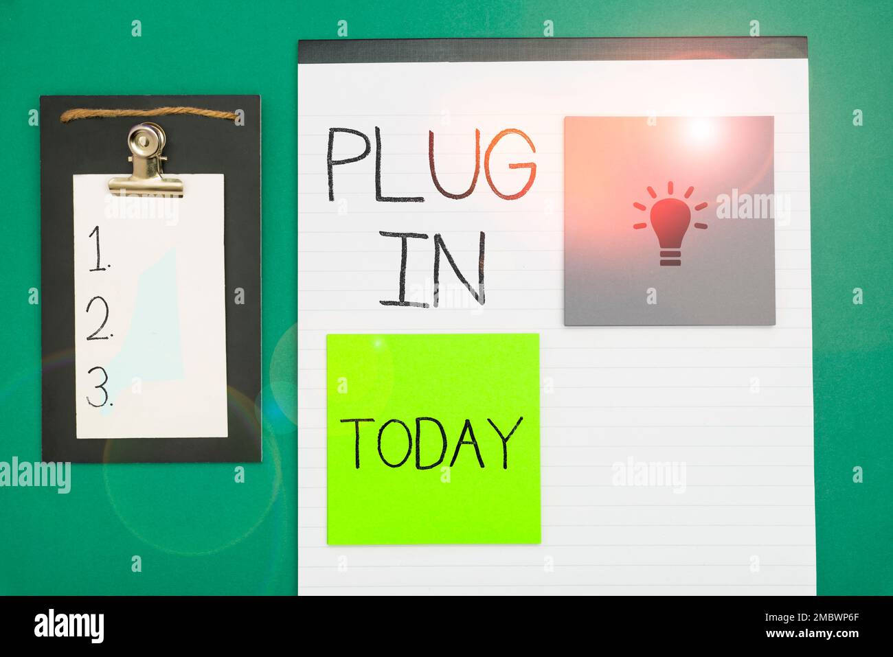 Sign displaying Plug In, Business concept putting device into ...