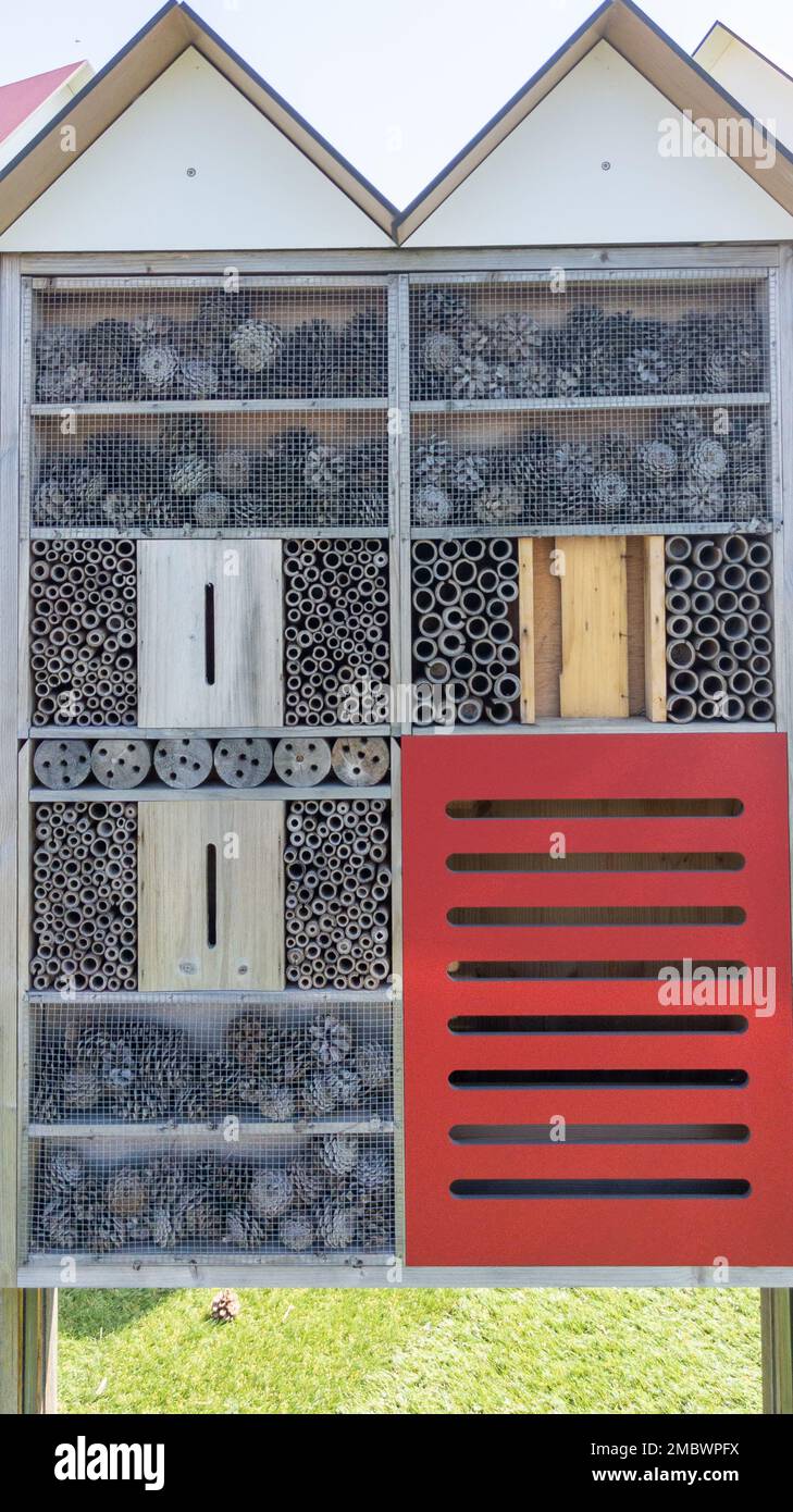 bug hotel insect house wooden hut gives protection and nest aid to bees ...