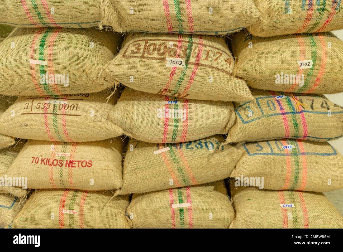 bags of coffee in storage ready for export Stock Photo - Alamy