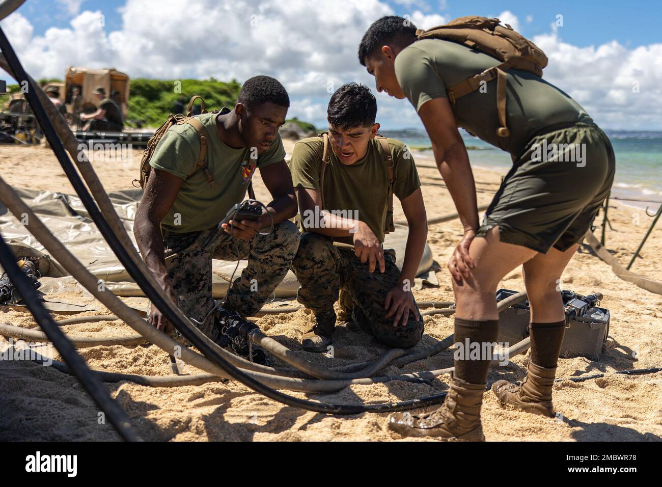 U.S. Marine Corps Cpl. Divine Snyder, right, Lance Cpl. Luis ...