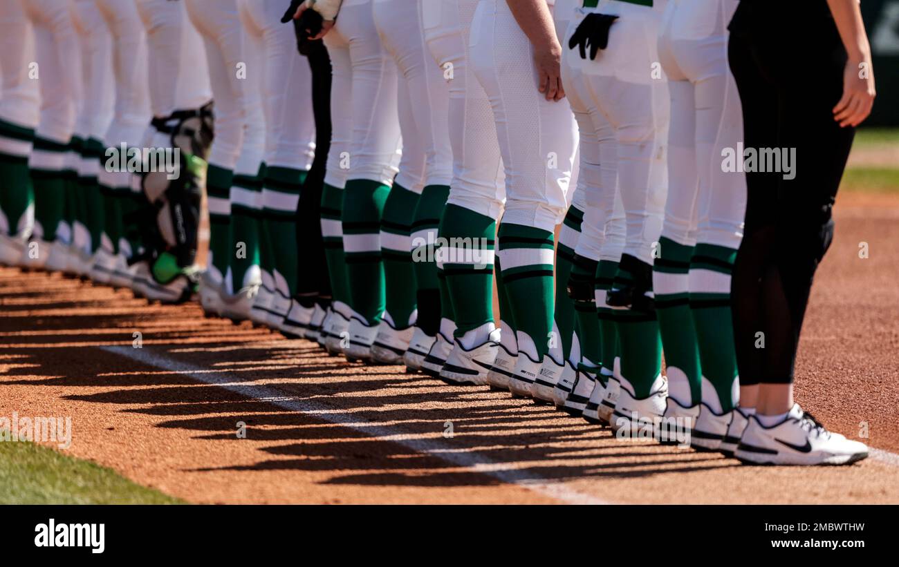 Marshall players line up for National Anthem during an NCAA softball ...