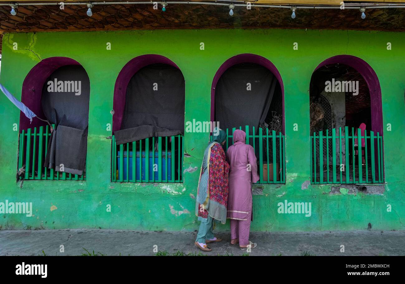 Kashmiri Shiite Muslim women pray at the shrine of Peer Syed Mehndi ...