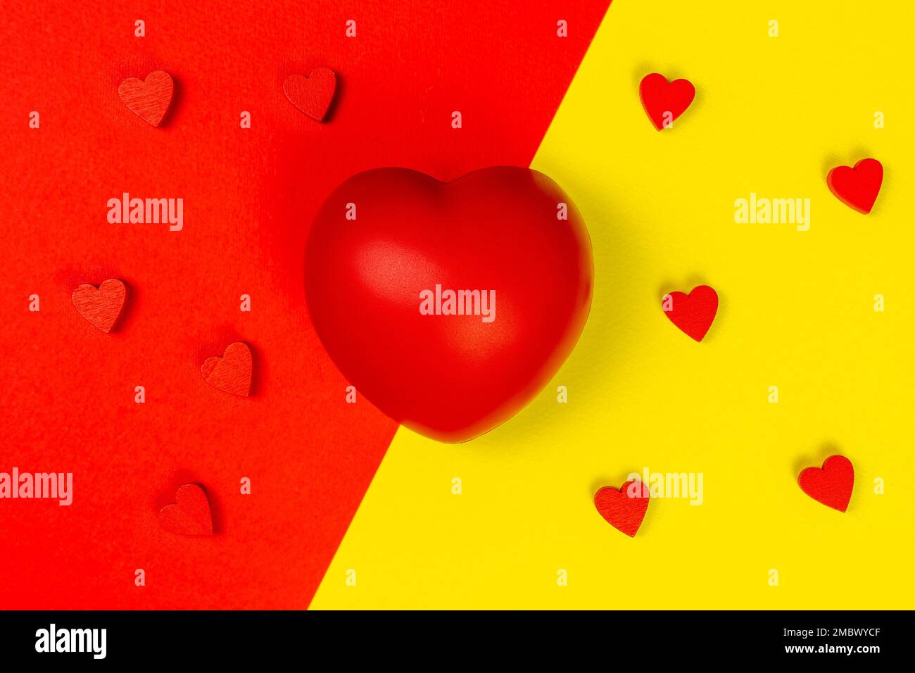 big heart and hearts on a two-tone background, top view Stock Photo - Alamy