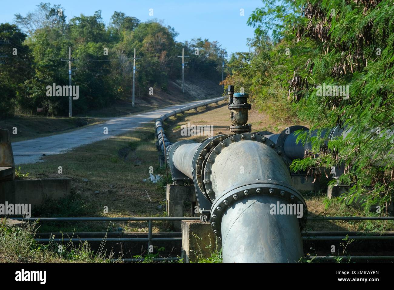 Pipe is installed along the bridge on the pipe support. Water steel ...