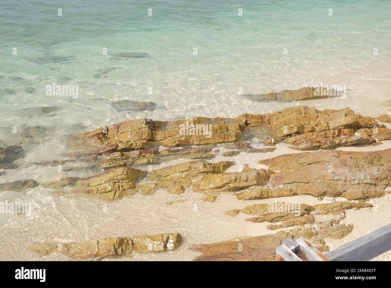 A beautiful shot of the sea waves gently hitting the rocks Stock Photo ...