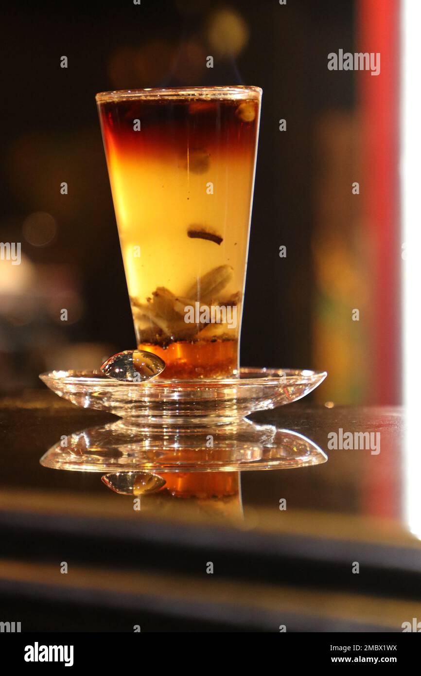 A vertical closeup shot of a tea made of natural components in a ...