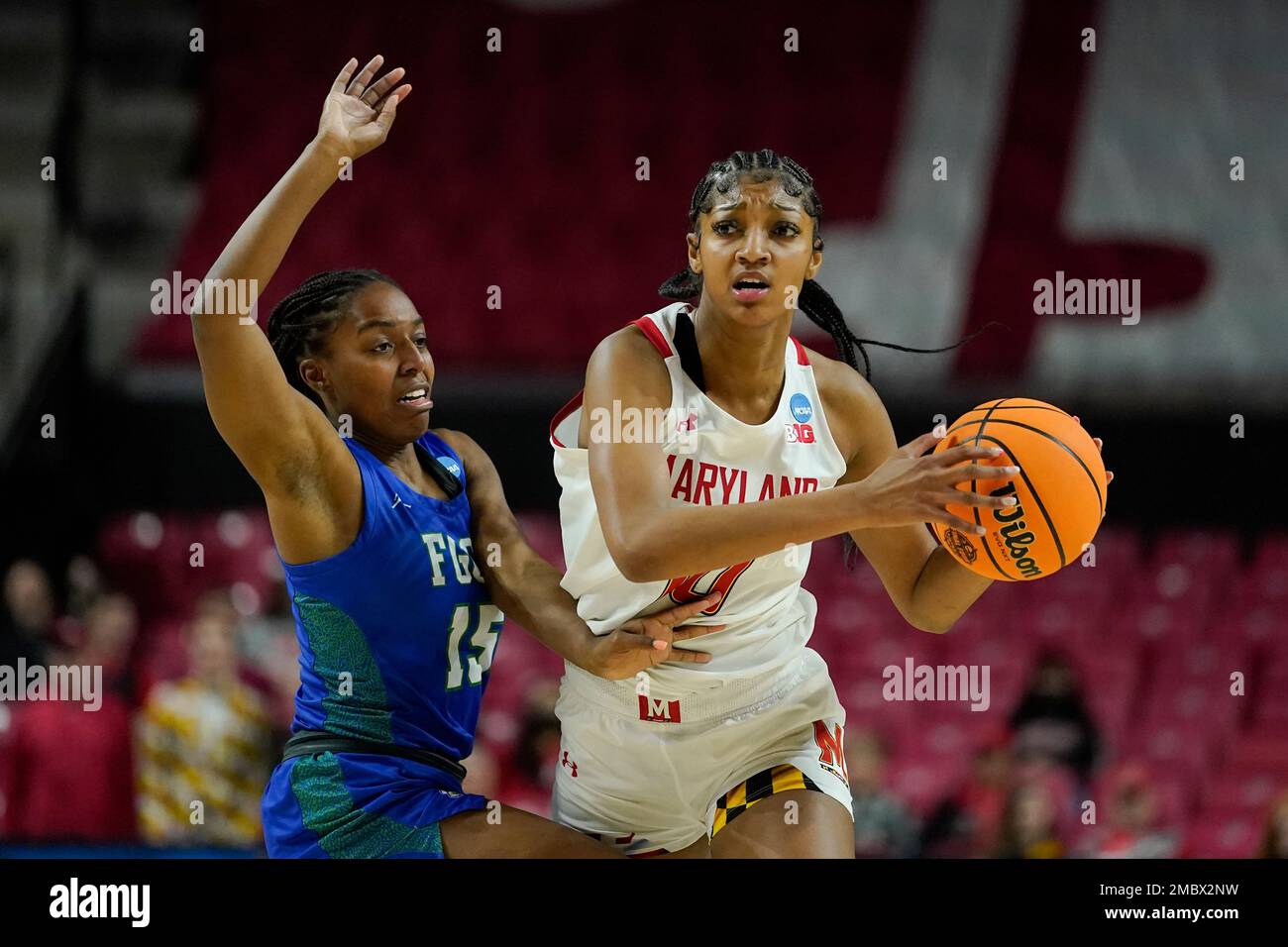 Maryland forward Angel Reese, right, drives against Florida Gulf Coast ...
