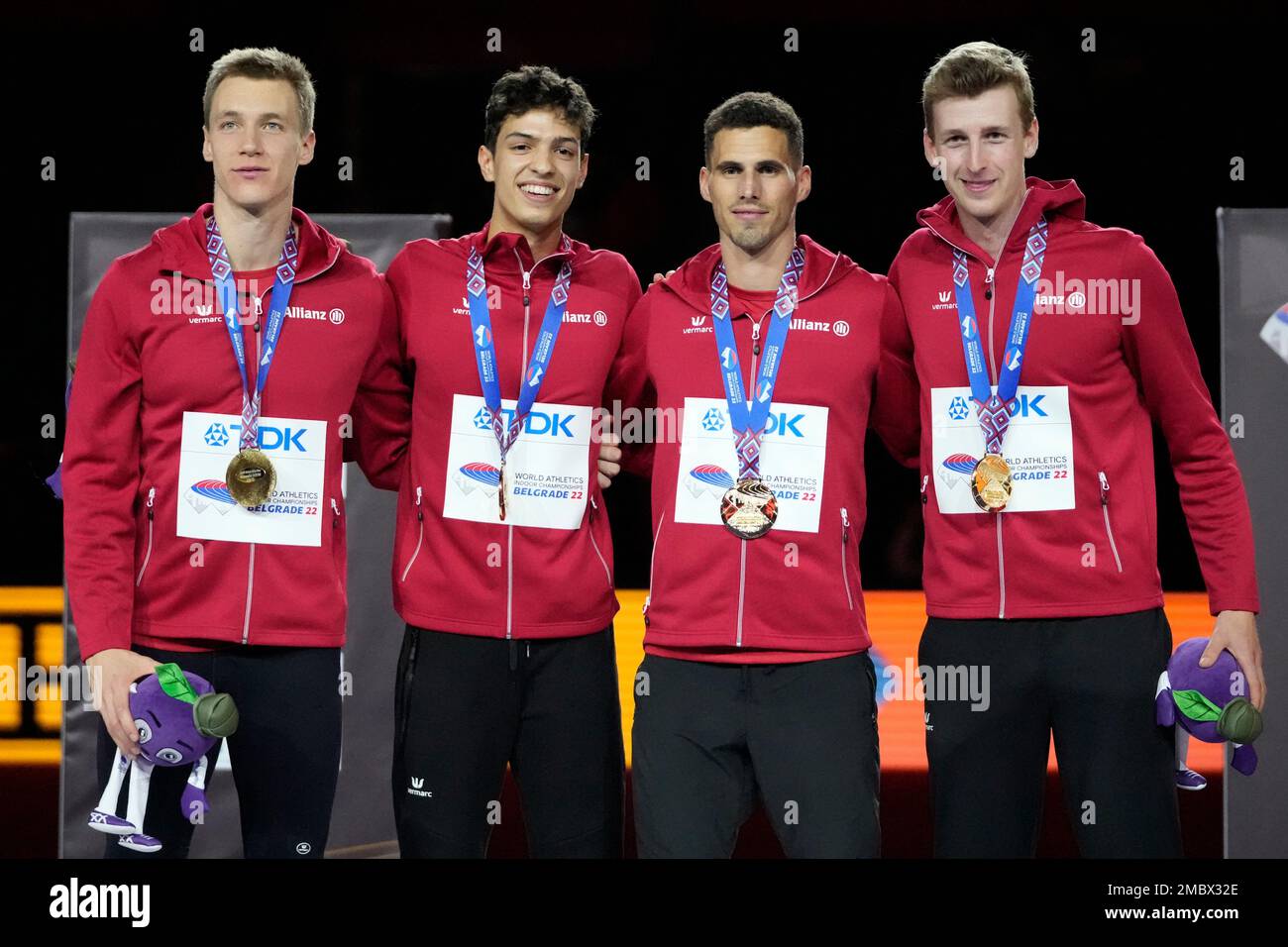 The team of Belgium pose with their gold medals on the podium of the ...