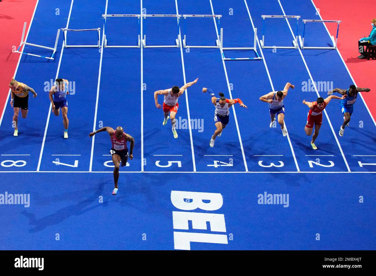 Grant Holloway, of the United States, 3rd left, wins a Men's 60 meters ...