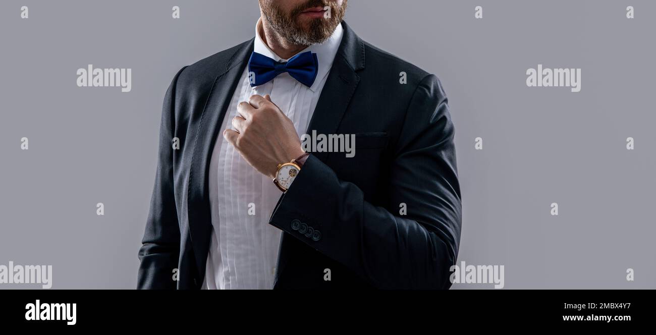 cropped view of formal tuxedo man in studio. photo of man wearing ...