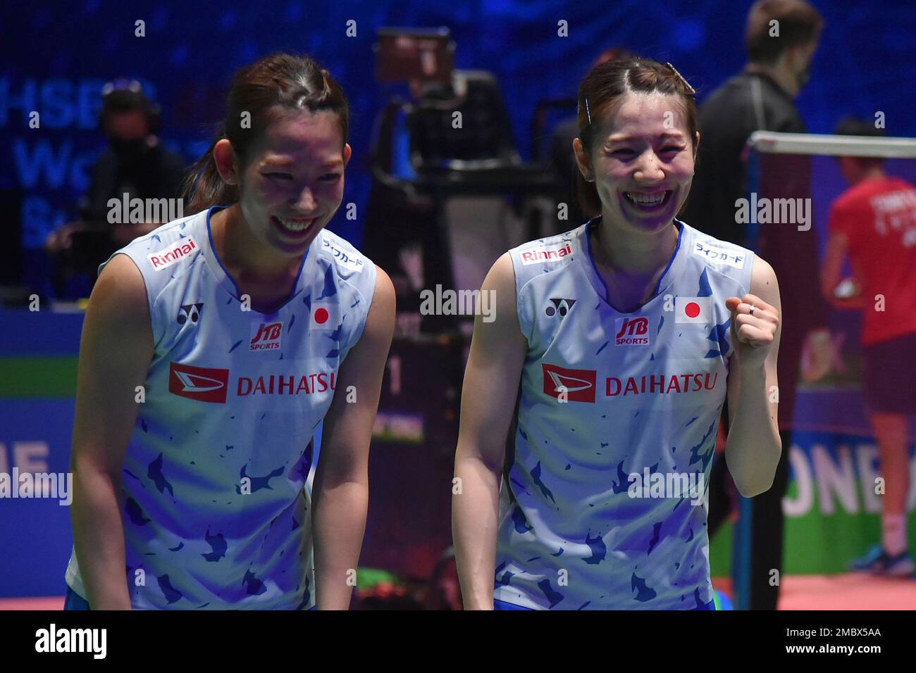 Japan's Nami Matsuyama, left, and Chiharu Shida celebrate after defeating China's Zhang Shu Xian ...