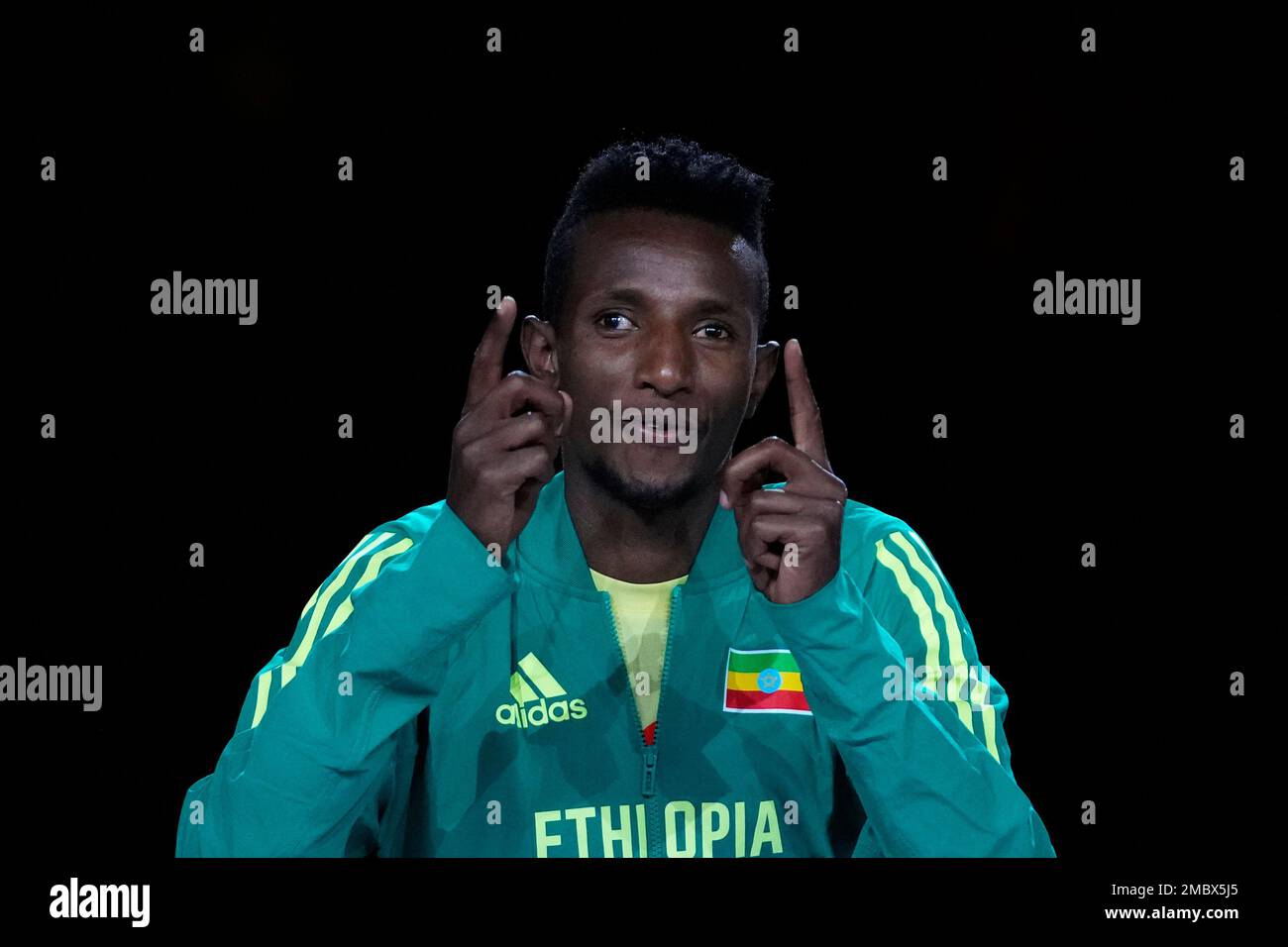 Selemon Barega, of Ethiopia, climbs on the podium after winning the Men ...