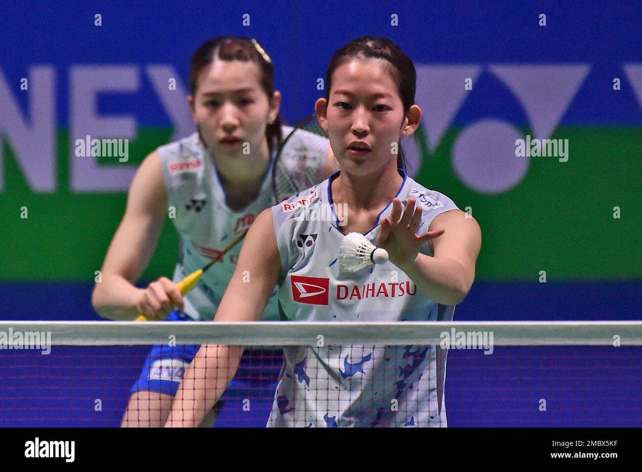 Japan's Nami Matsuyama, right, and Chiharu Shida serve against China's Zhang Shu Xian and Zheng ...