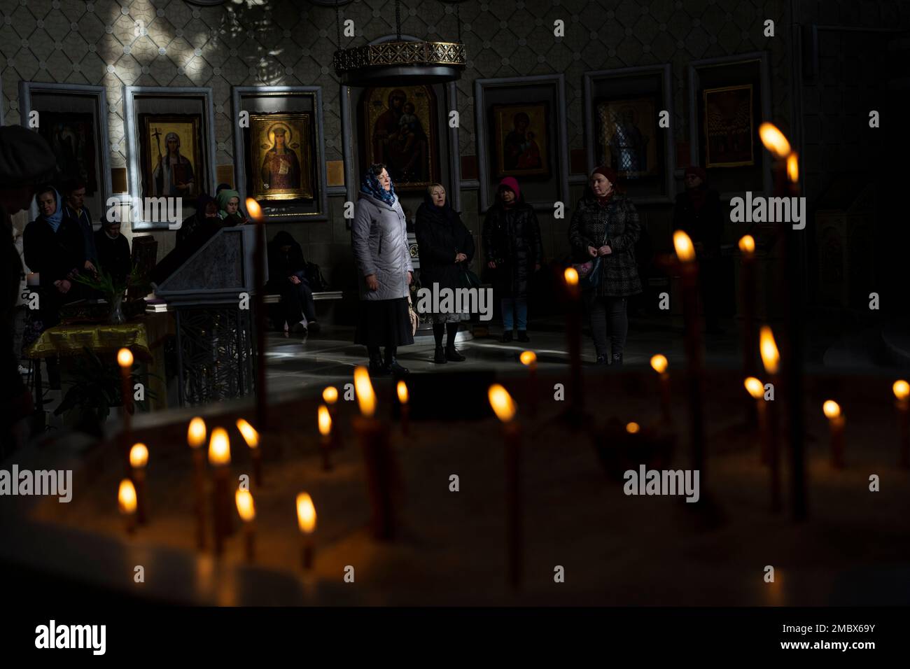 Faithfuls pray inside the "Transfiguration of Jesus" Orthodox Cathedral ...