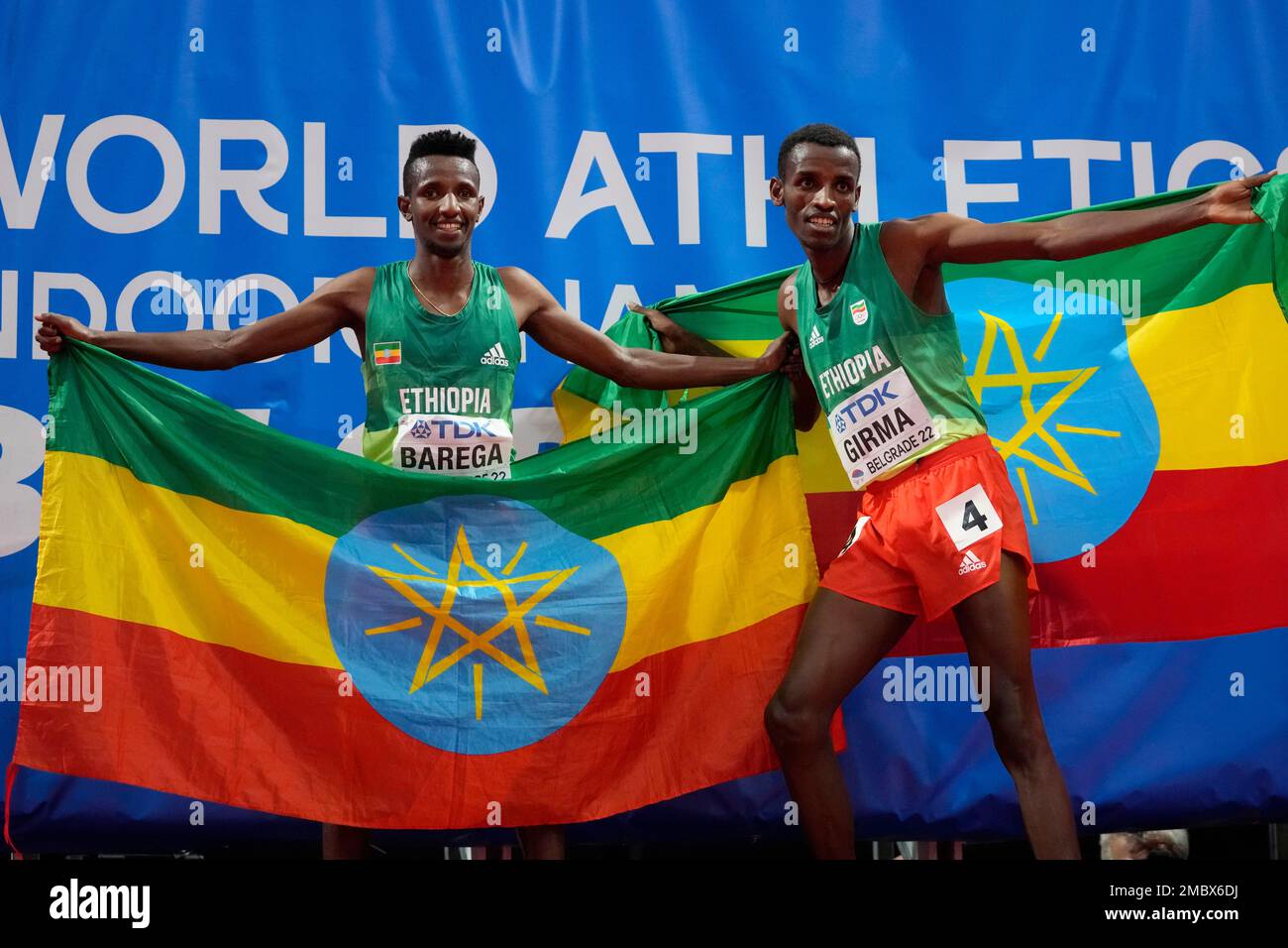 Gold medalist Selemon Barega, left, and silver medalist Lamecha Girma ...