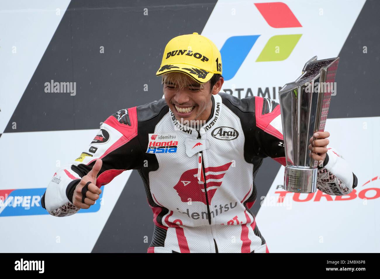 Thailand's rider Somkiat Chantra of IDEMITSU Honda team Asia celebrates ...