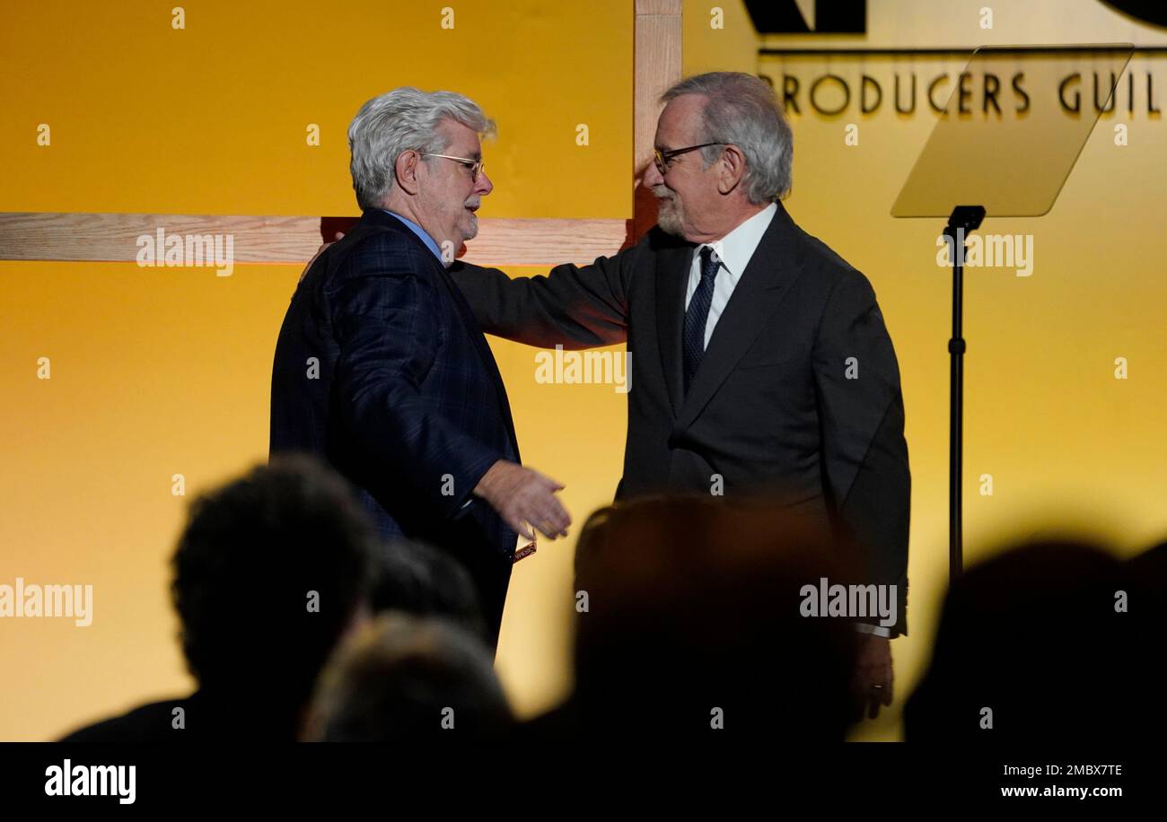 Steven Spielberg, right, presents George Lucas with the Milestone Award ...