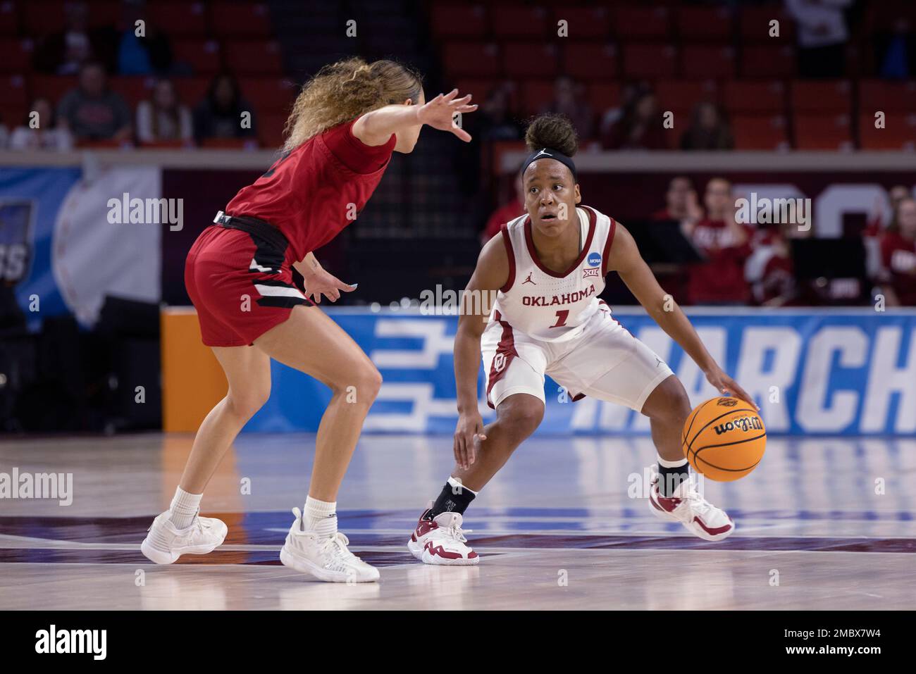 IUPUI guard Destiny Perkins, left, guards Oklahoma guard Nevaeh Tot ...