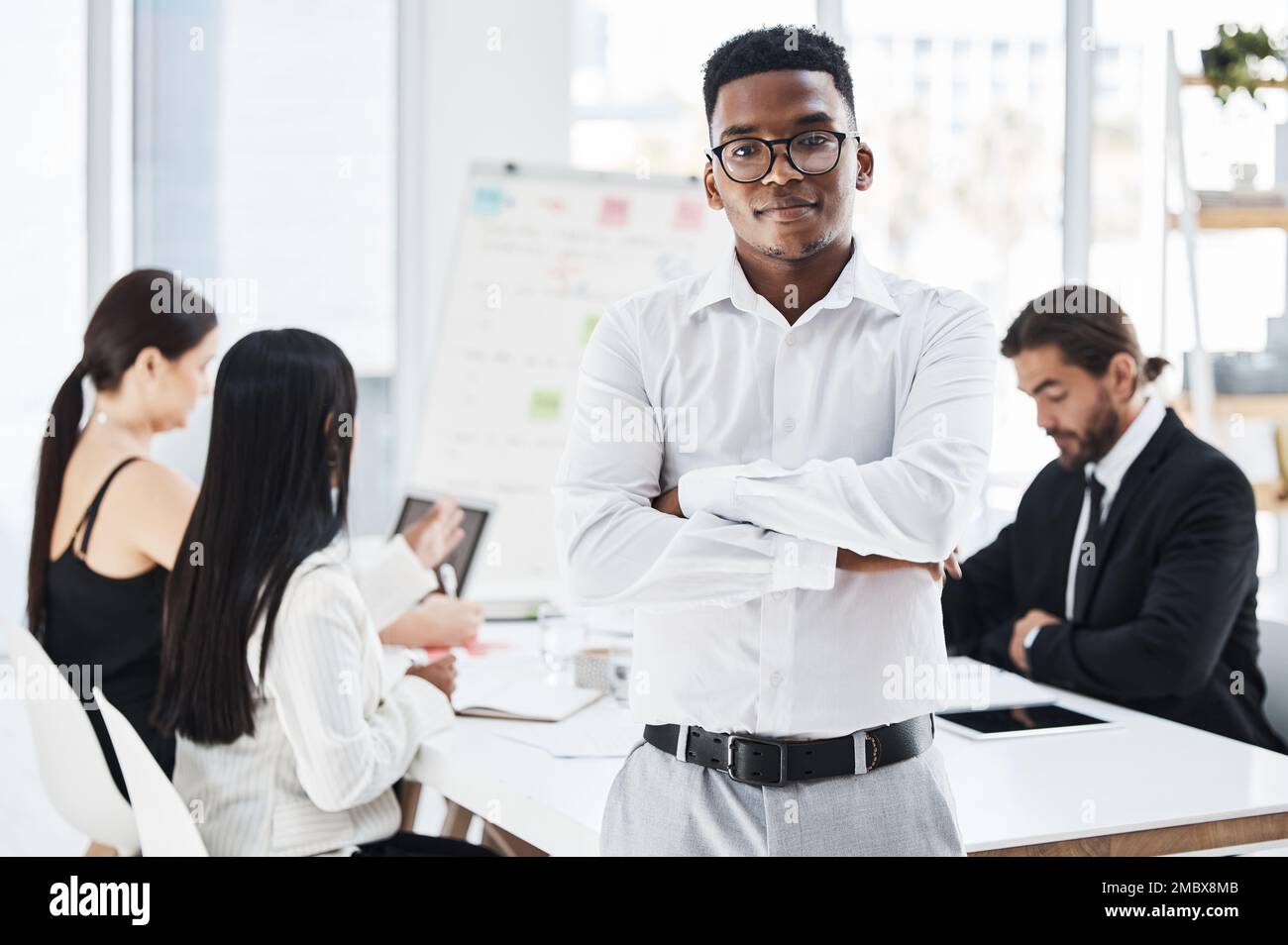 Black man, leader and portrait with business people in meeting ...