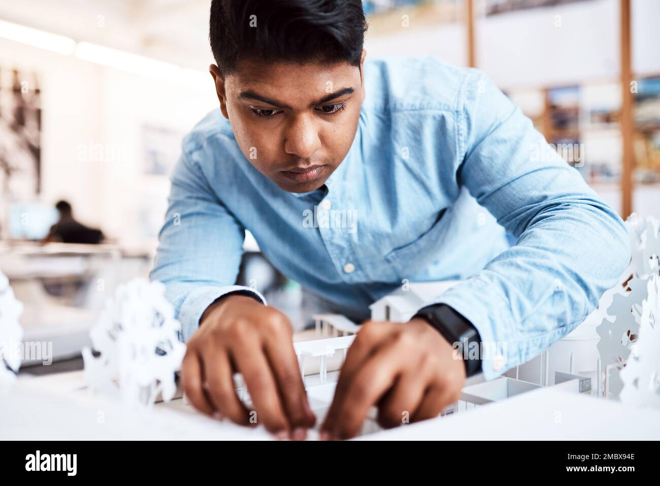Embarking on his next building project. a young architect designing a ...
