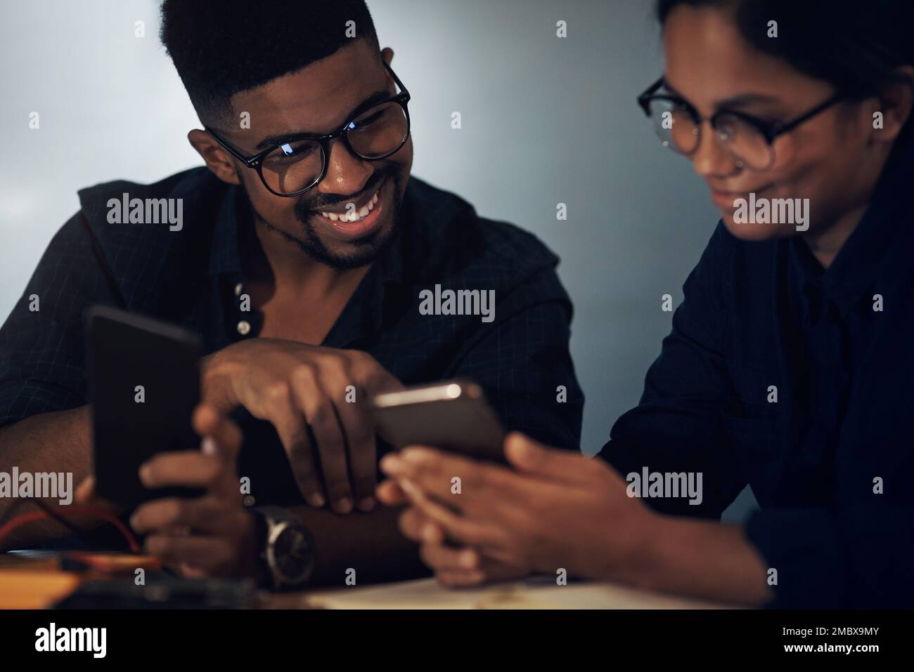 Smarter technology for faster repairs. two young technicians using ...