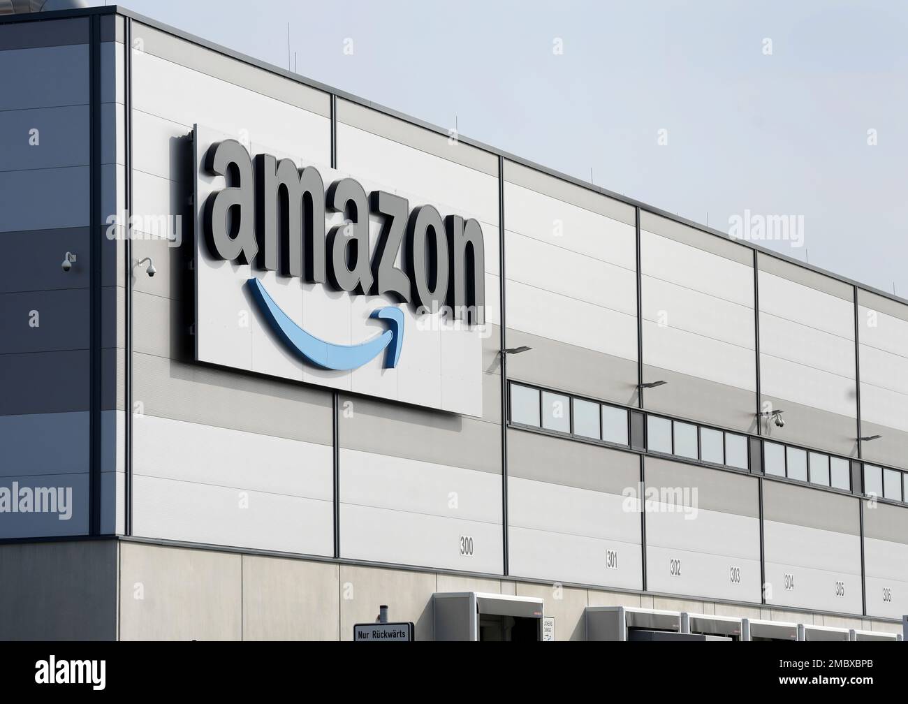 An 'amazon' company logo is seen on the fassade of a company's building ...