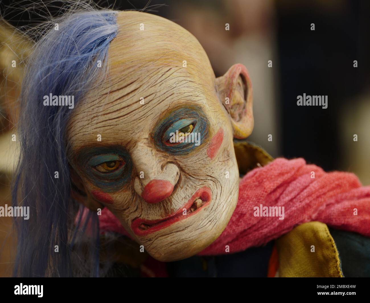 terrible clown devil mask with blue hair Stock Photo - Alamy