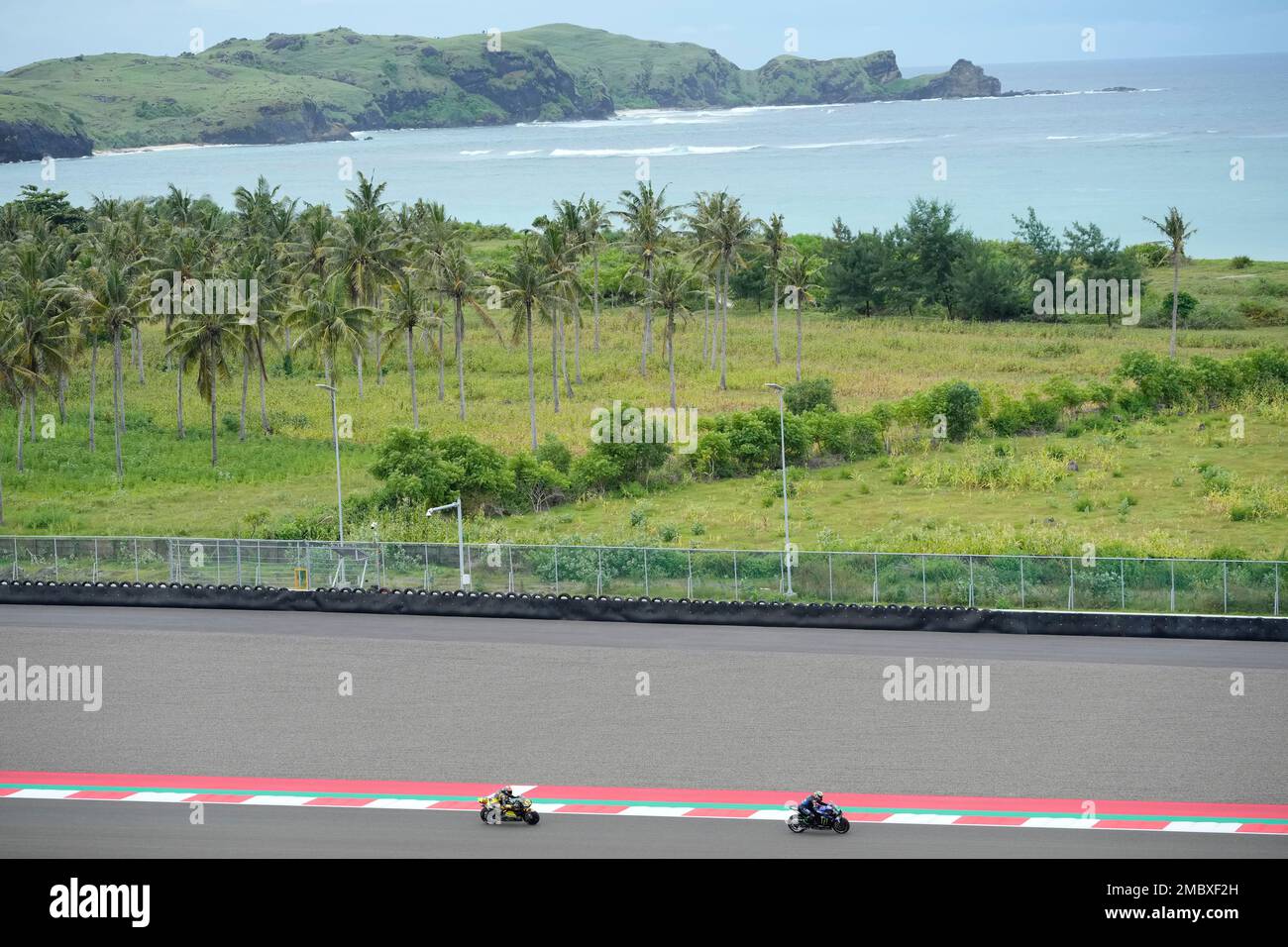Moto GP riders ride along the scenic track during third free practice ...