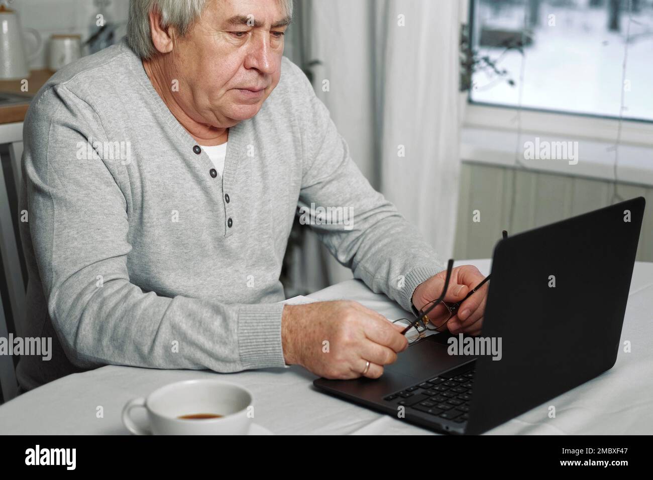 Thoughtful male professional workplace works hi-res stock photography ...