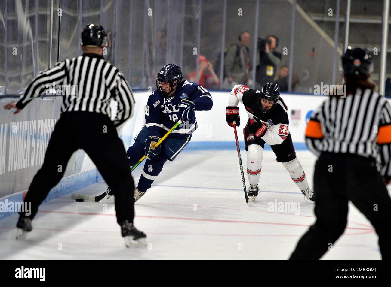 Yale's Rebecca Vanstone (18) advances the puck past Ohio State's Liz ...