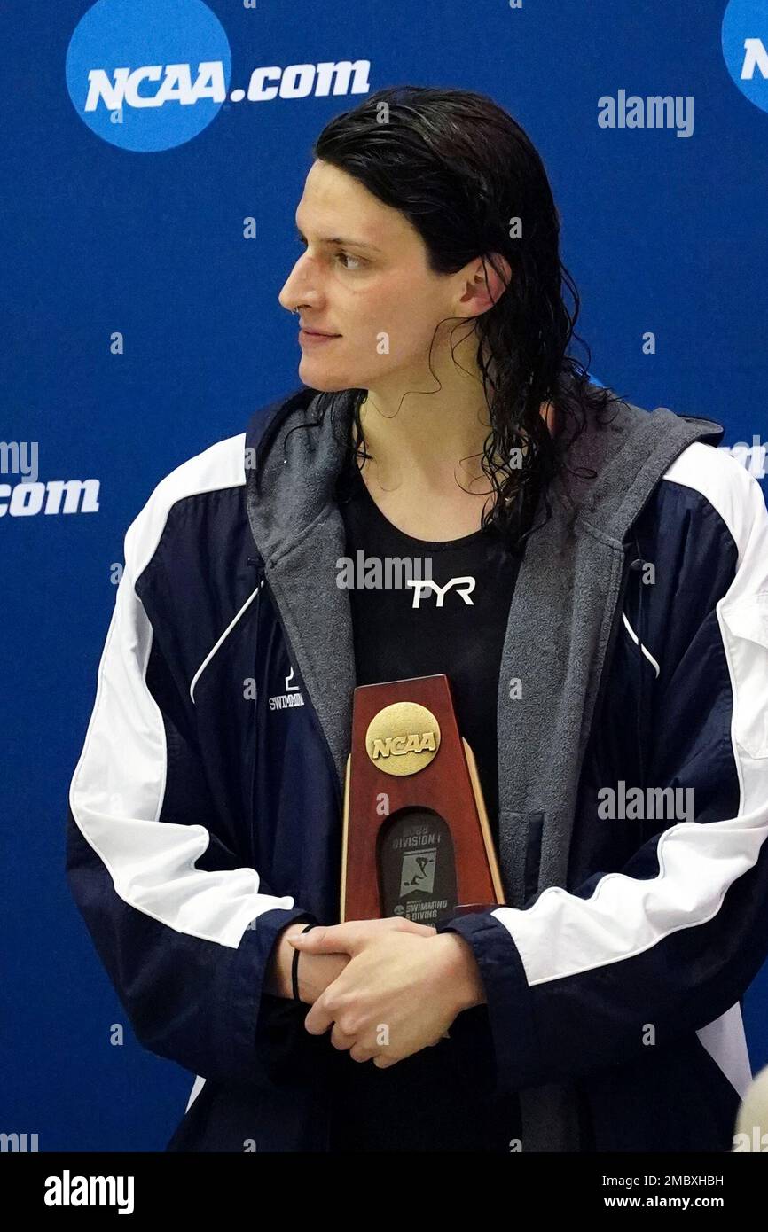 Pennsylvania's Lia Thomas holds the fifth-place trophy after the 200 ...