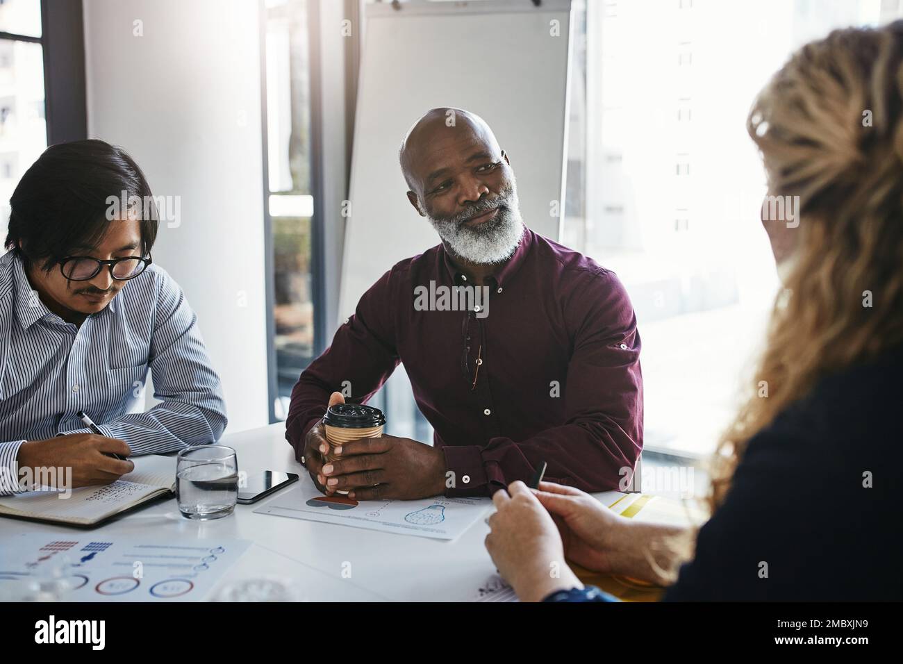 Business people, black man and staff in meeting, brainstorming and ...