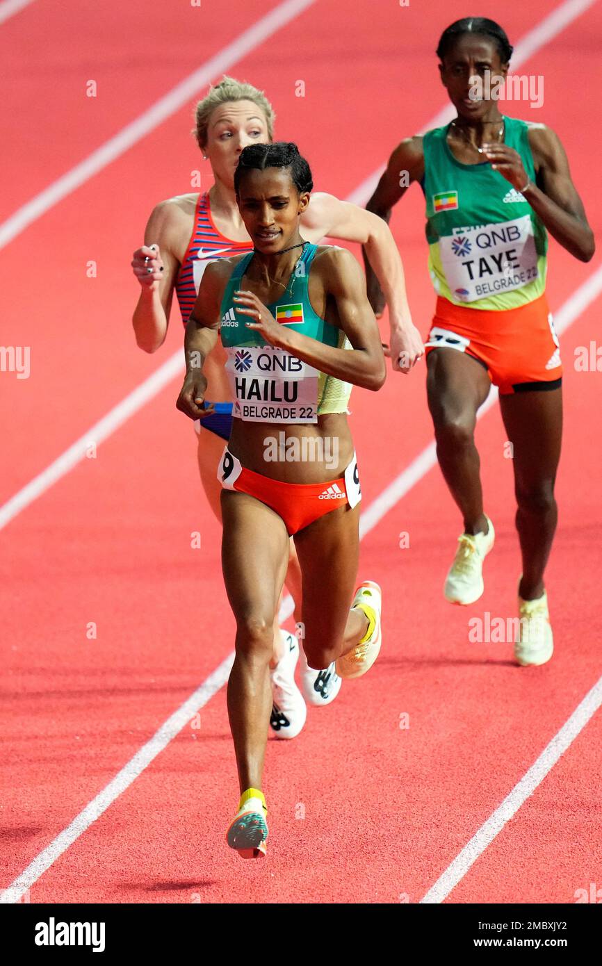 Lemlem Hailu, of Ethiopia, crosses the finish line ahead of Elinor ...