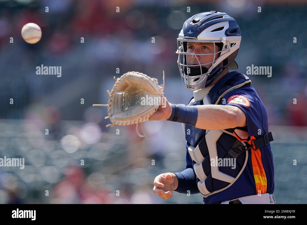 Houston Astros catcher Korey Lee warms up before a spring training ...