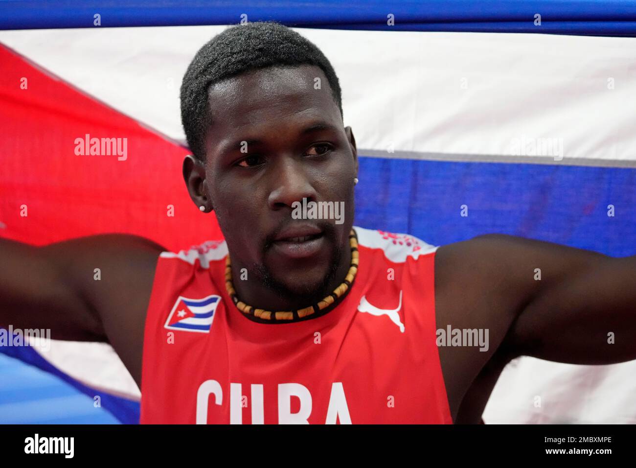 Lazaro Martinez, of Cuba, celebrates after winning the Men's triple ...