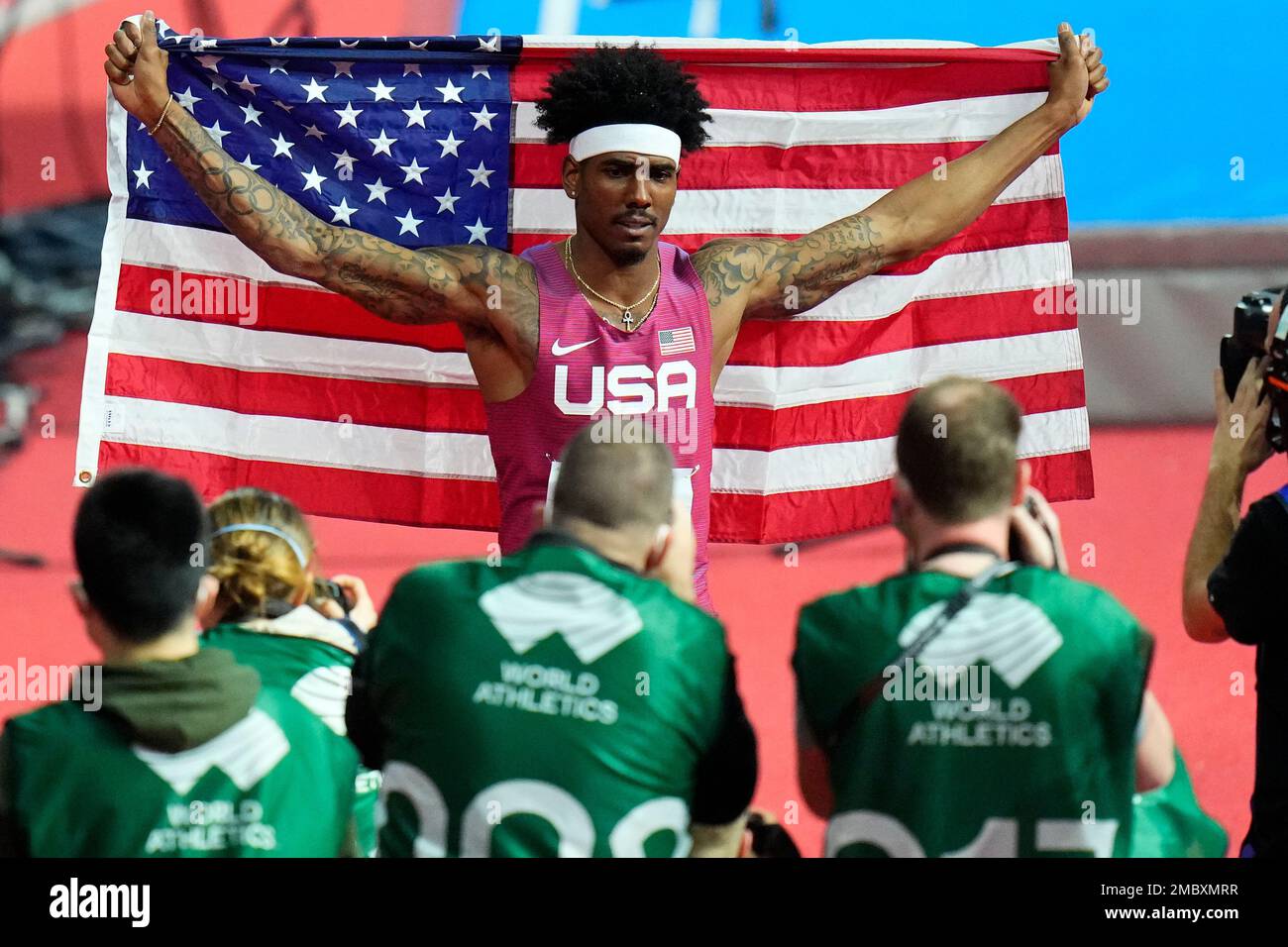 Donald Scott, of the United States, poses after winning the bronze ...