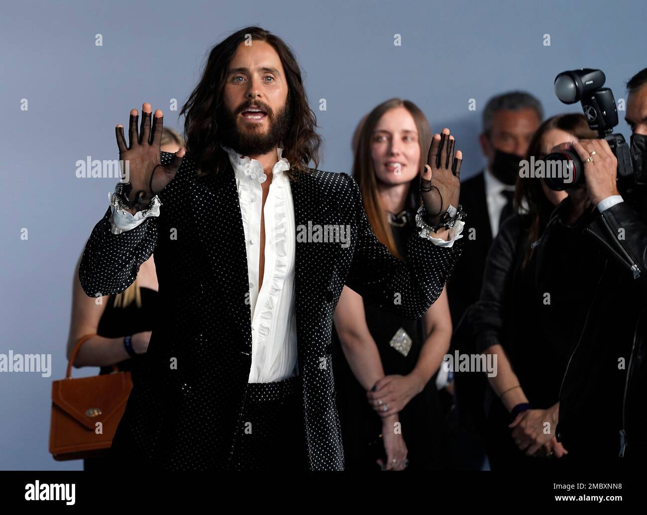 Jared Leto poses at the global premiere of the Apple TV+ miniseries ...