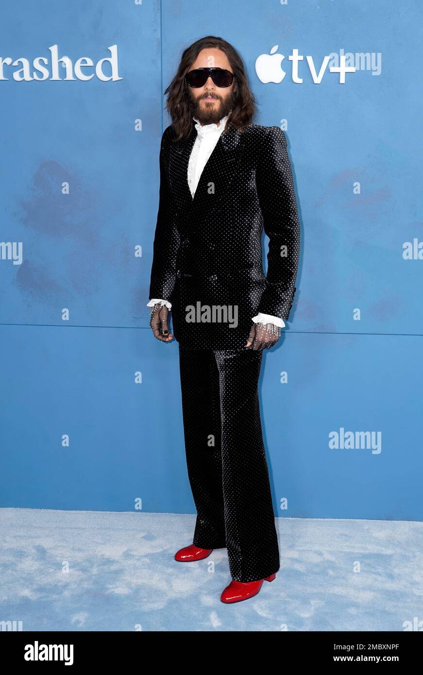 Jared Leto poses at the global premiere of the Apple TV+ miniseries ...
