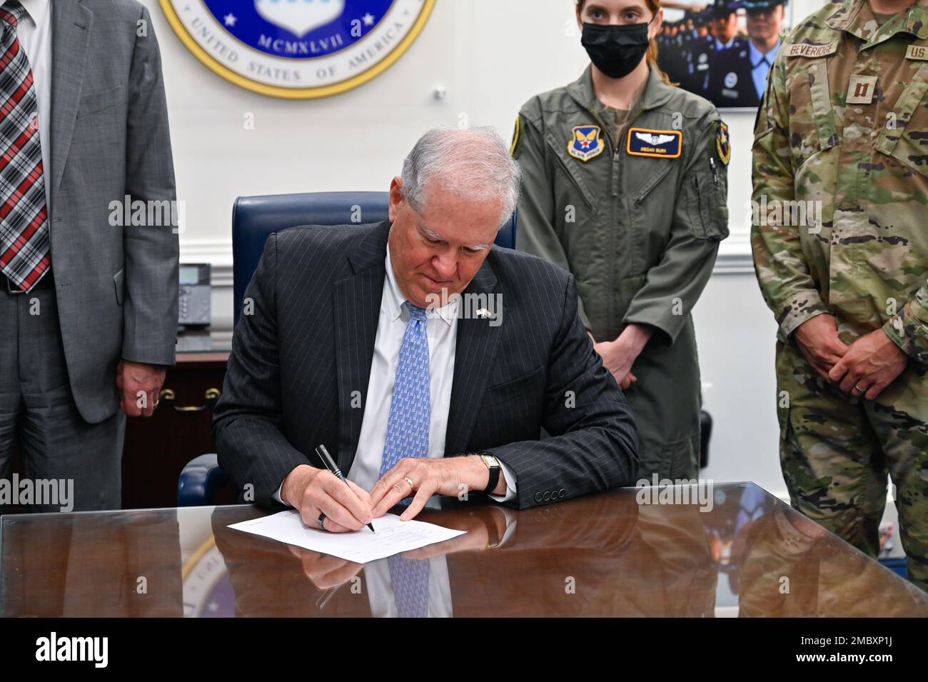 Secretary of the Air Force Frank Kendall signs a program guidance ...