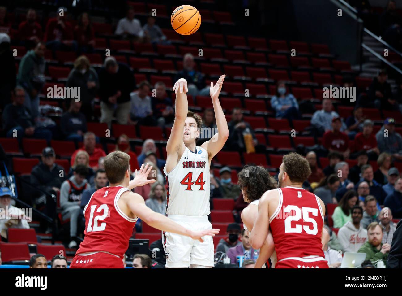 St. Mary's guard Alex Ducas (44) shoots above Indiana forward Miller Kopp (12) and forward Race ...