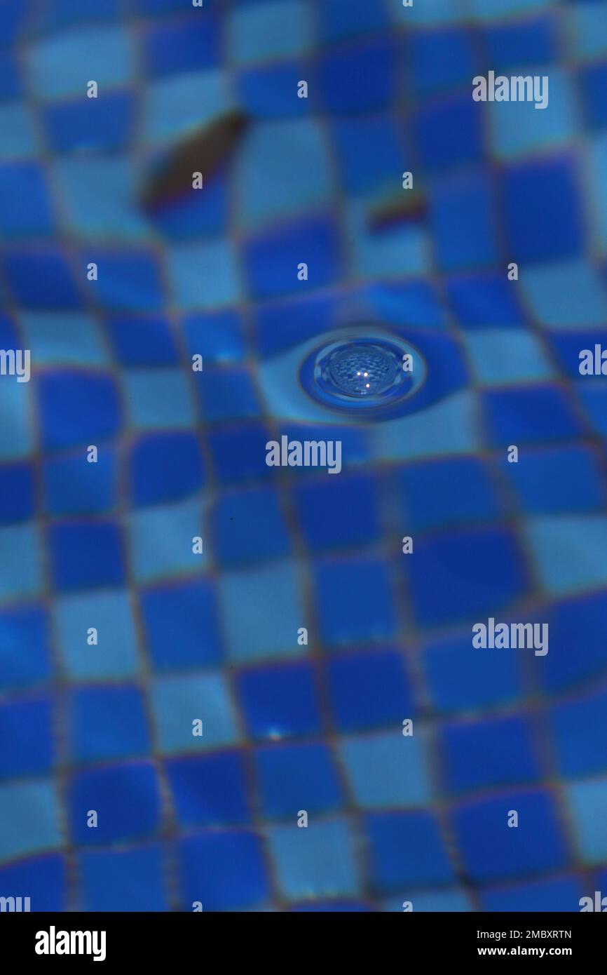 A vertical shot of a water bubble in the swimming pool Stock Photo - Alamy