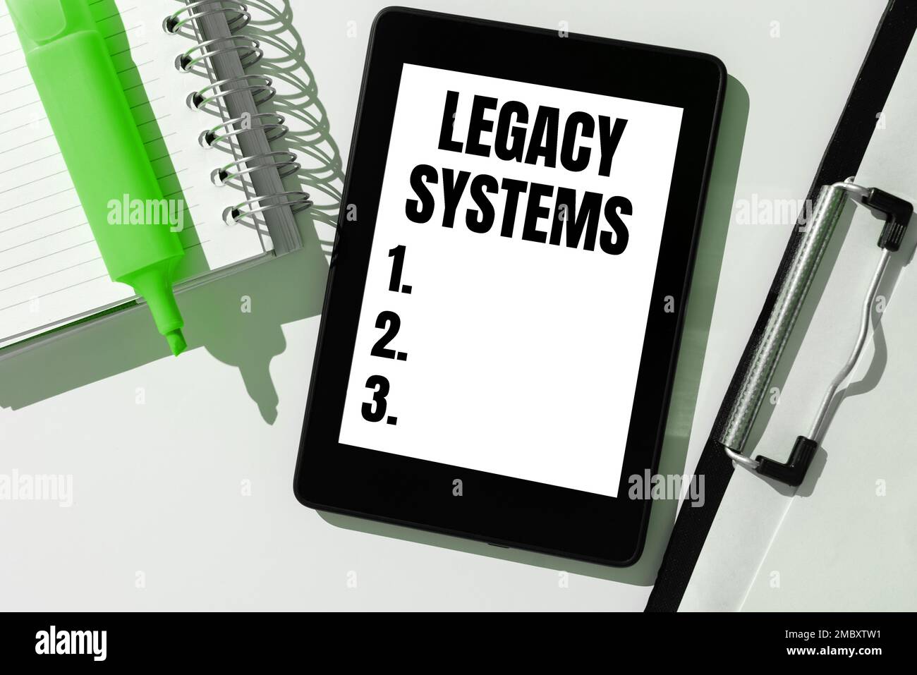 Text caption presenting Legacy Systems. Word Written on old method ...