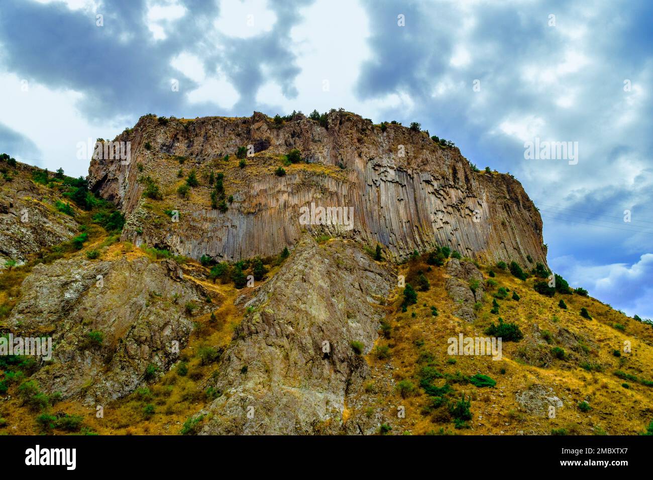 A breathtaking landscape with steep rock formations caved by river ...