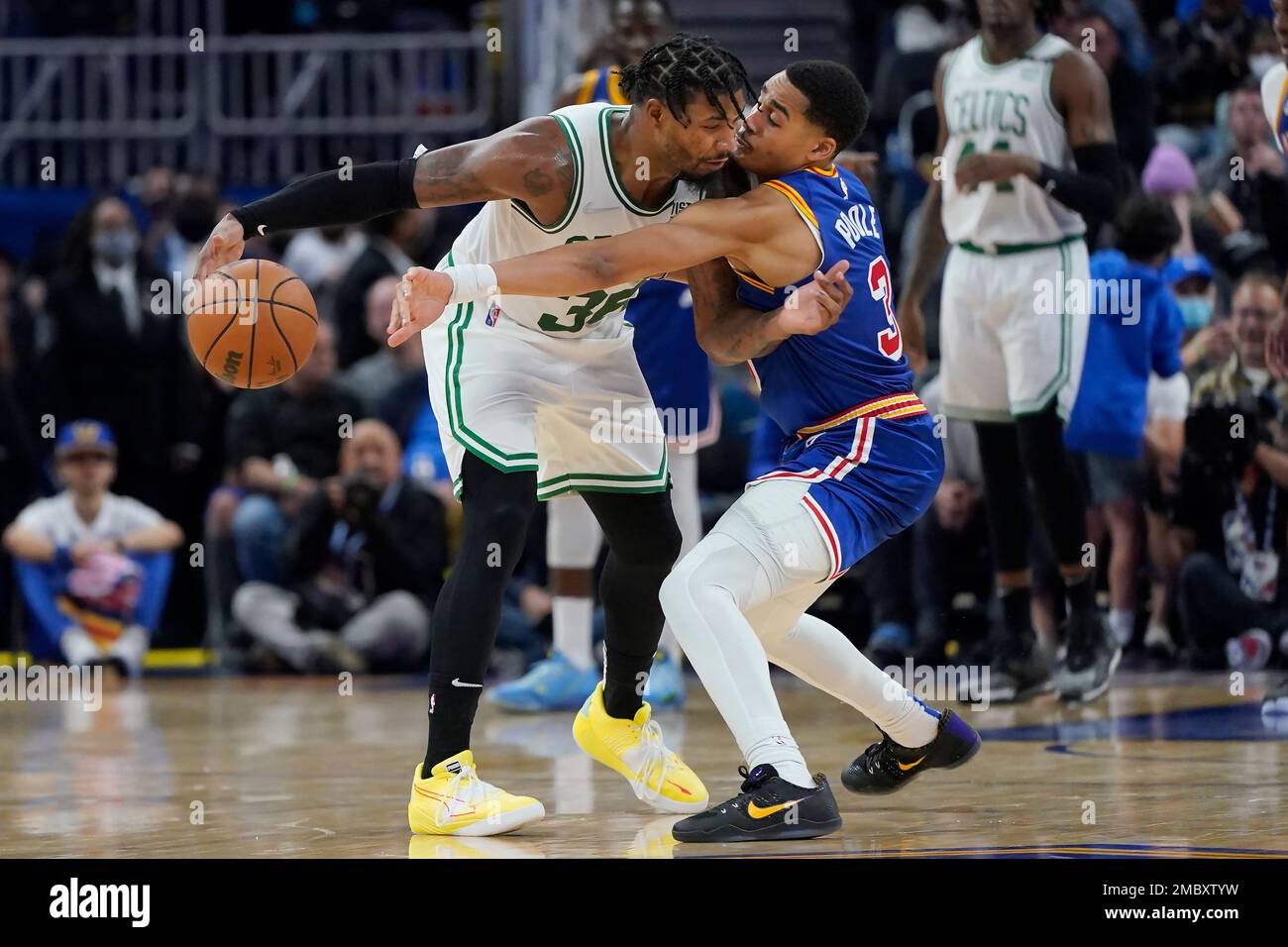 Boston Celtics guard Marcus Smart, left, and Golden State Warriors ...
