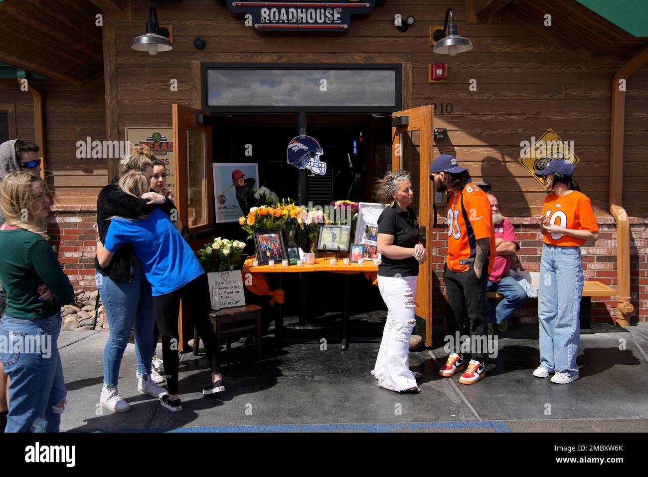 People attend a memorial for Jackson Zinn at a Texas Roadhouse ...