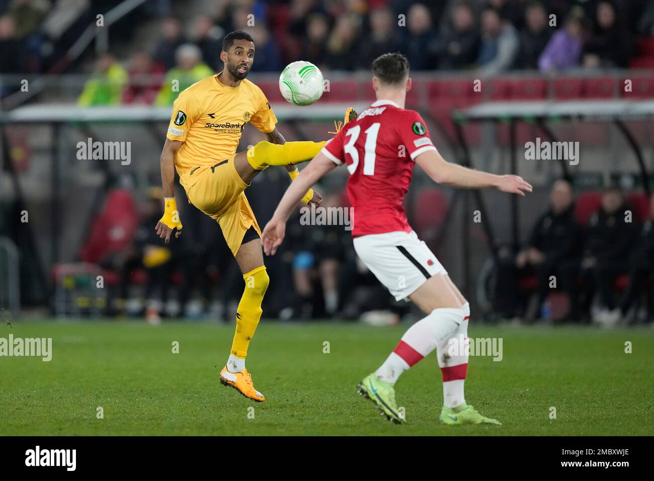 Bodo's Amahl Pellegrino, left, and AZ's Sam Beukema vie for the ball ...