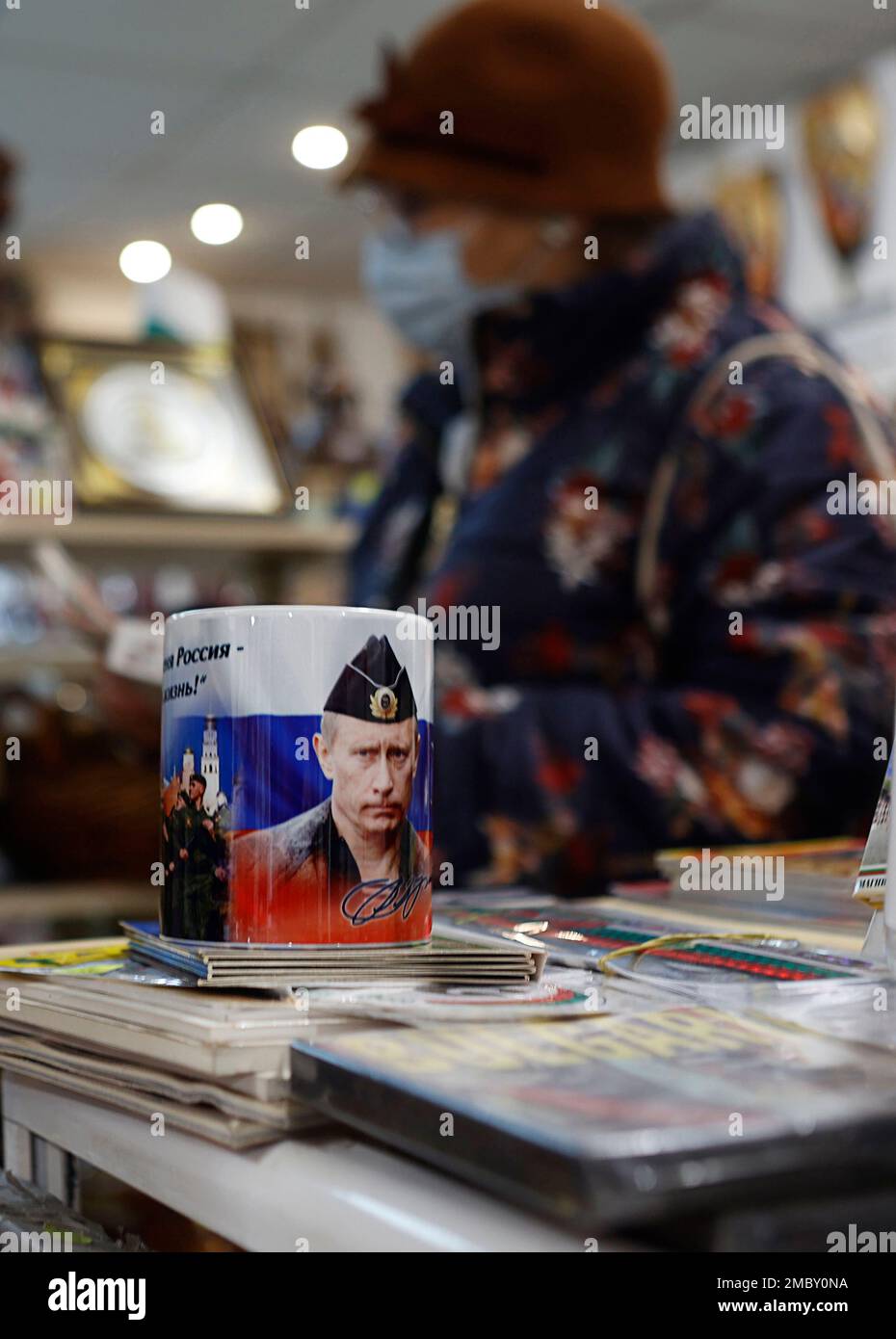 A photo of Russian President Vladimir Putin is seen on a mug in a ...