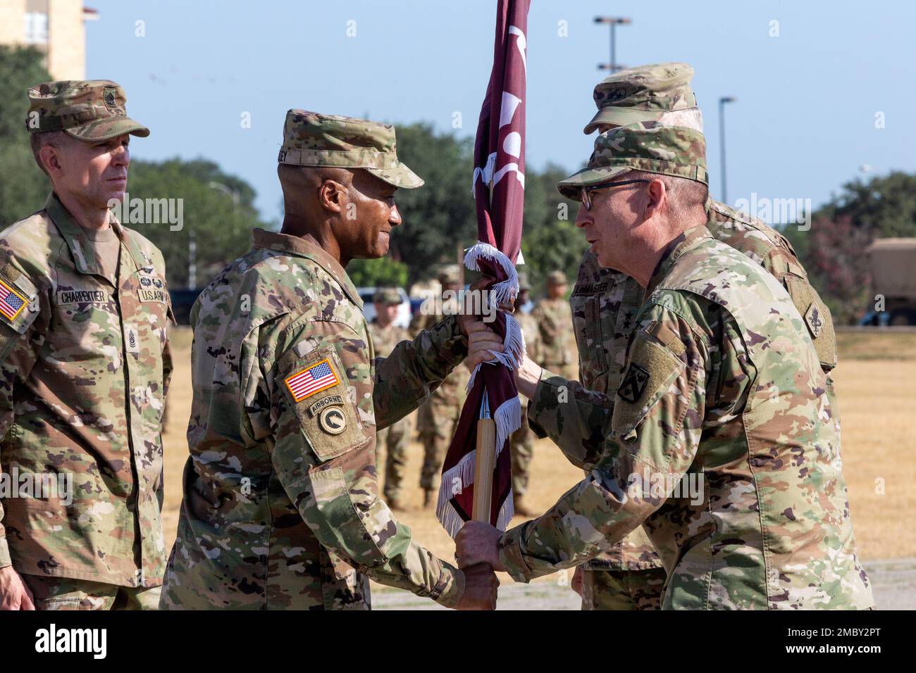 Maj. Gen. Mike Talley accepts the unit colors from Lt. Gen. Theodore ...