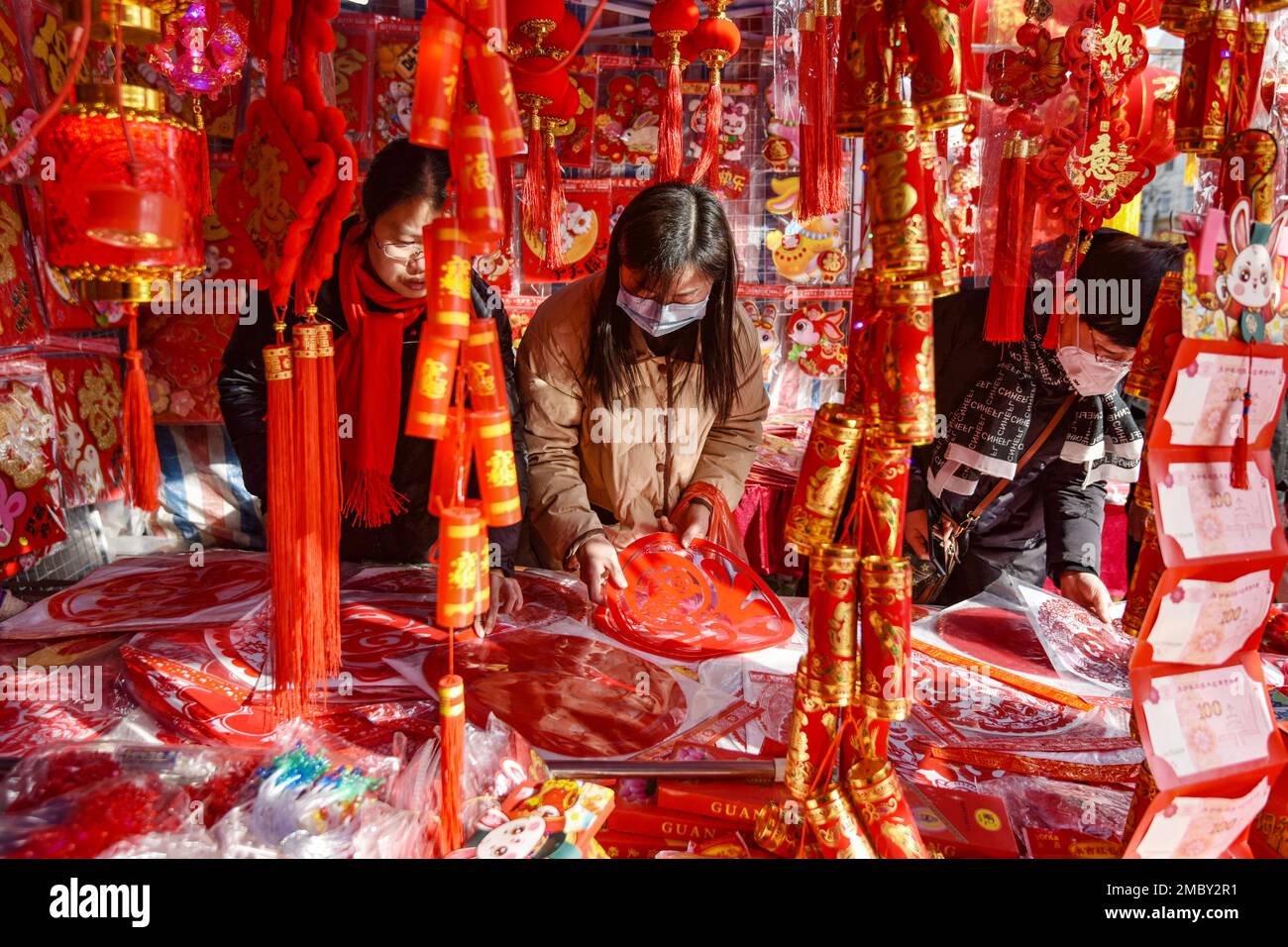Some customers are picking up Spring couplets and other Spring Festival ...